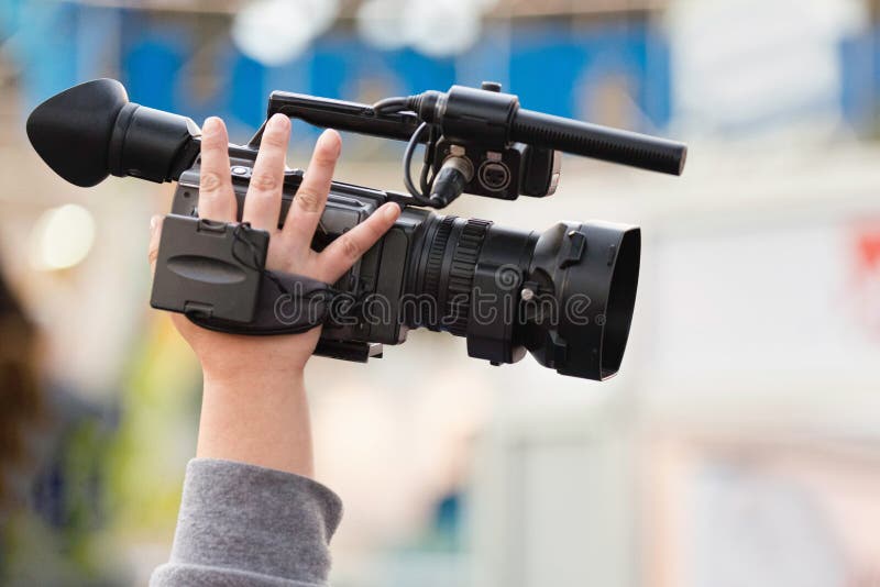 Camera recording stock photo. Image of journalist, side - 218394342