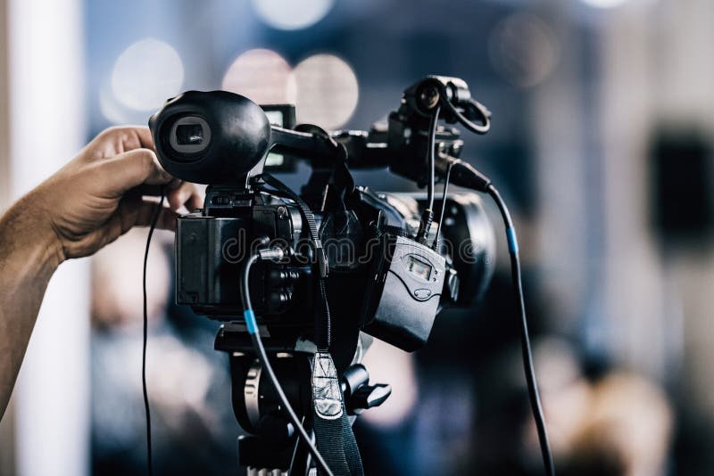 Camera Recording at a Press Conference Stock Image - Image of people ...