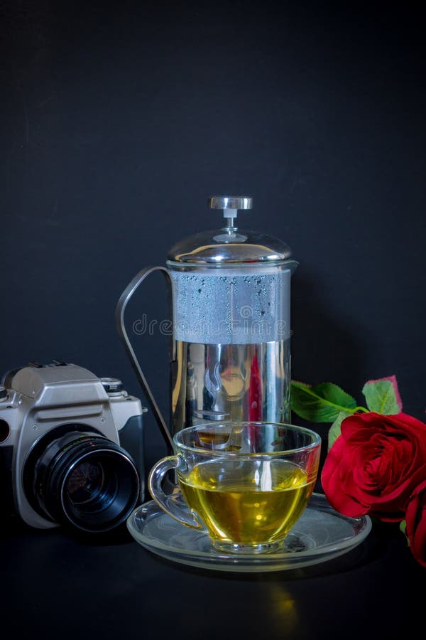 Camera, Red Roses and Tea stock image. Image of breakfast - 108235055