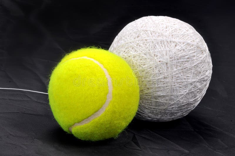 Thread and tennis ball stock image. Image of ball, neon - 191657047