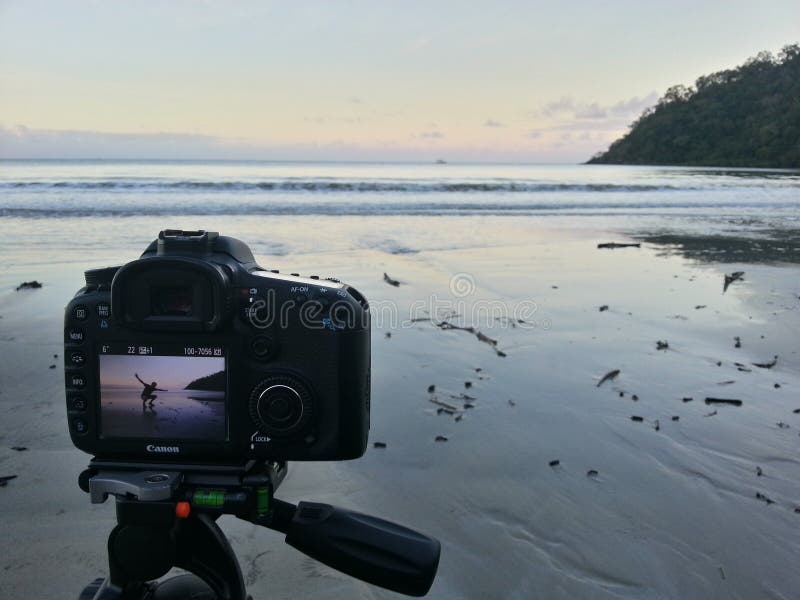 Camera Showing Person on an Empty Beach at Sunset Editorial Image ...