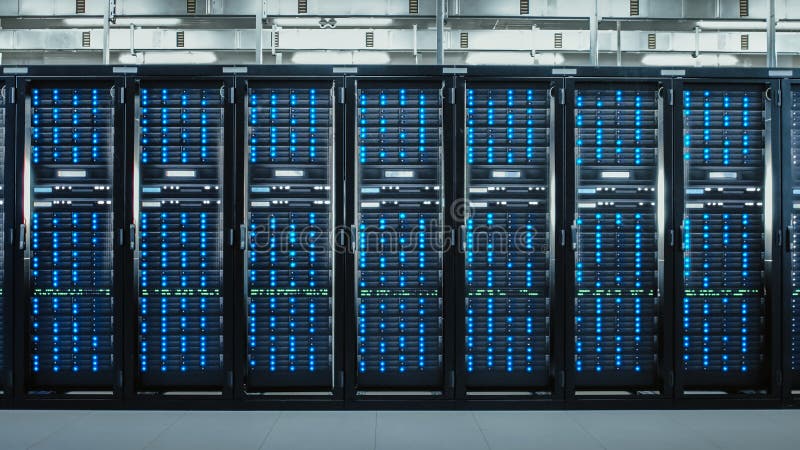Camera Slide-Trough Shot of a Working Data Center with Rows of Rack ...
