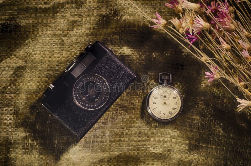 Camera and stopwatch stock image. Image of brown, light - 92235765