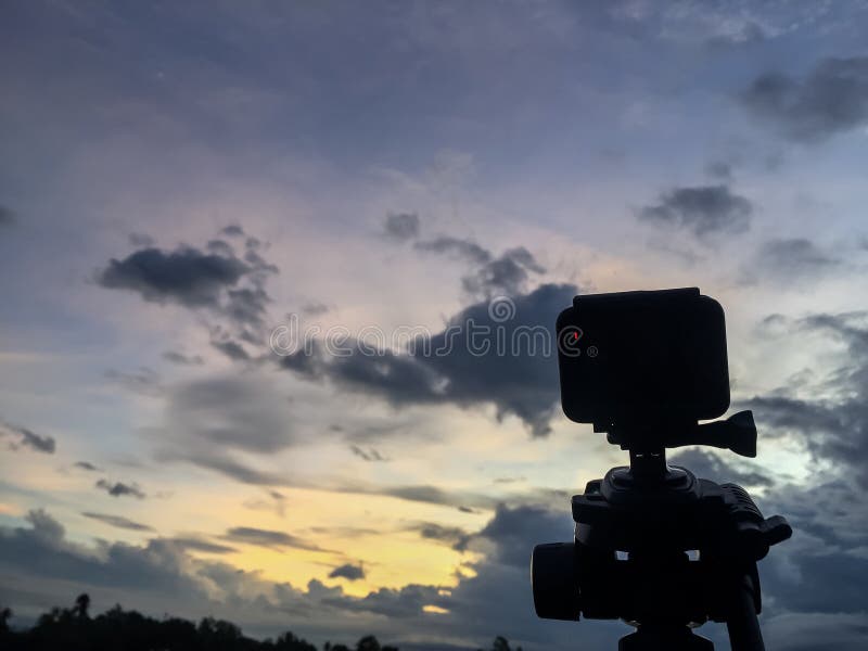 Camera and sunrise stock photo. Image of hobby, photographing - 290500302