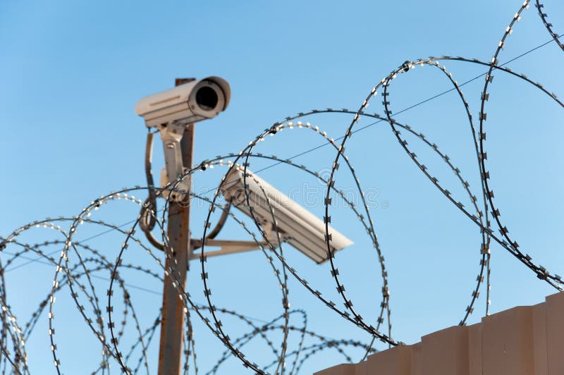 Security Cameras Over Fence Stock Image - Image of cameras, fence: 30665401
