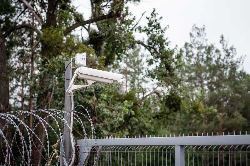 Camera surveillance fence stock image. Image of jail - 45490393