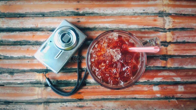 Camera with tea editorial photo. Image of outdoor, camera - 129530351