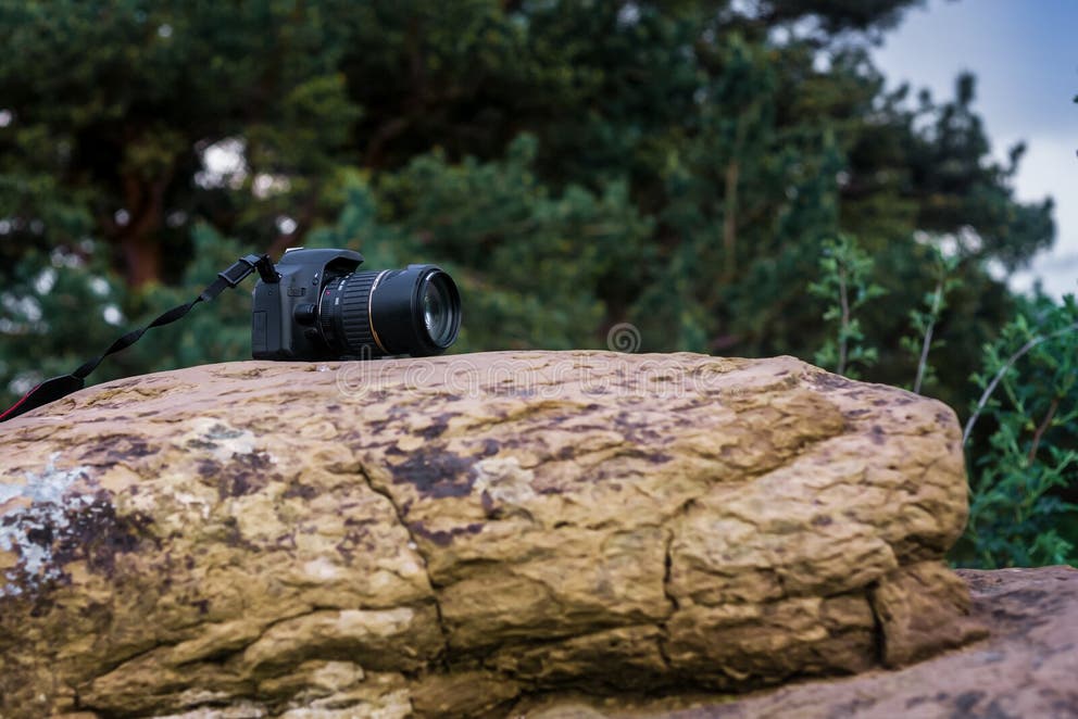 Camera on the stone stock image. Image of tree, equipment - 139409751