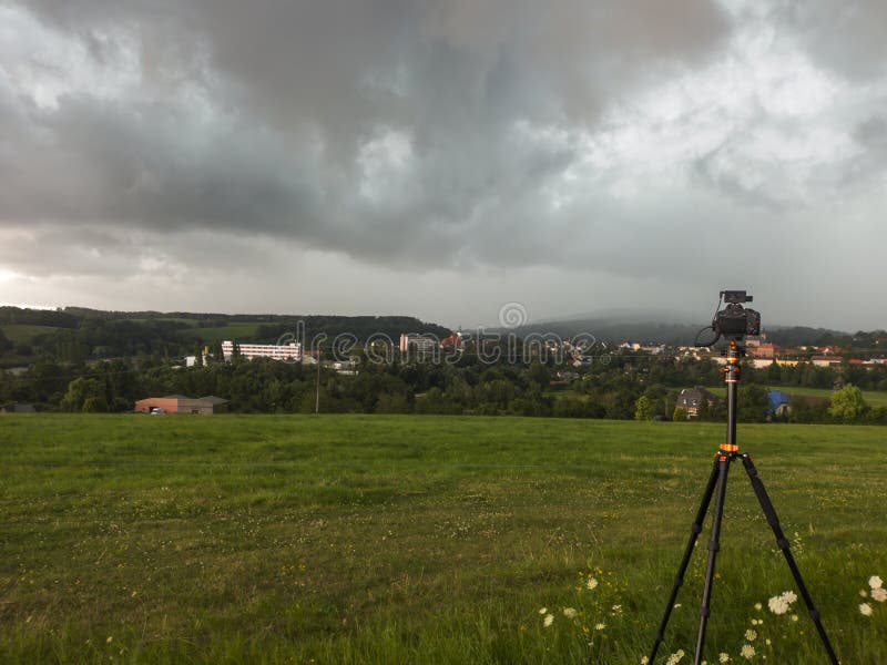 A Camera on a Tripod in a Field Overlook in the Small Town of Rochlitz ...