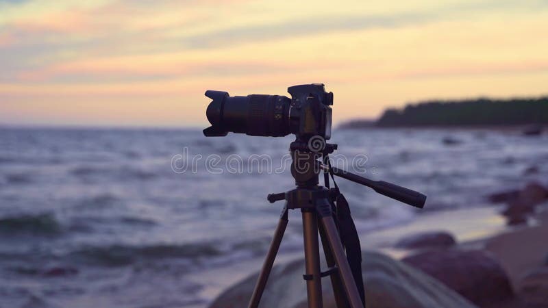 Camera on a Tripod Mounted on the Seashore in the Process of Shooting ...