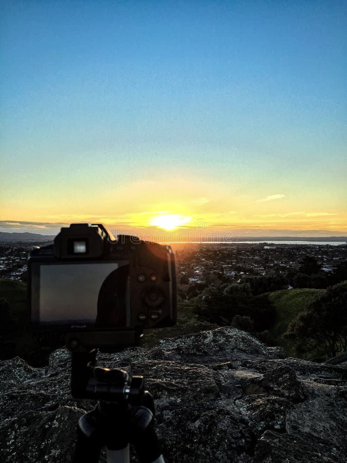 Tripod Sunset Camera stock photo. Image of background - 99283558