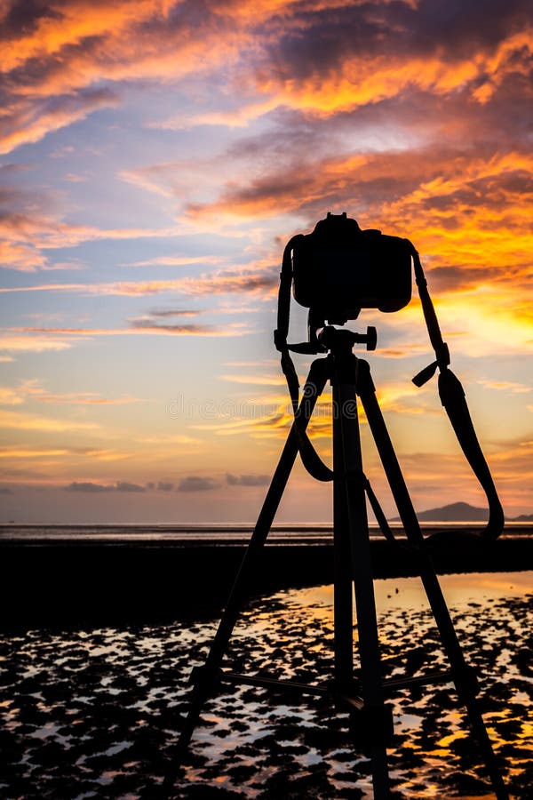 Camera and Tripod on the Sunset Stock Image - Image of landscape ...