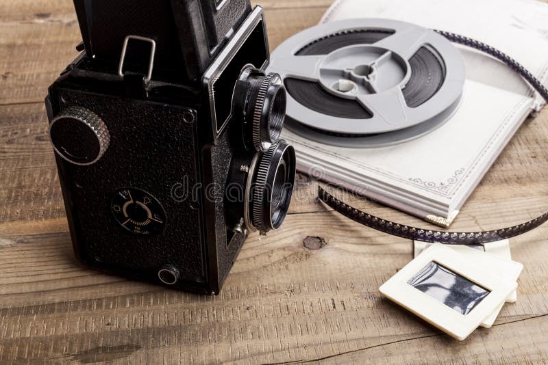 Camera on Wood Table stock photo. Image of note, notepad - 68743946