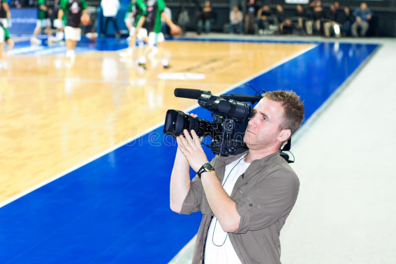 Professional cameraman editorial image. Image of active - 17976190