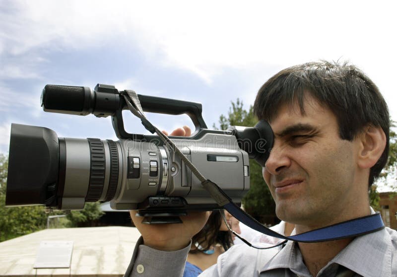 Cameraman stock image. Image of tape, computer, videocamera - 339169