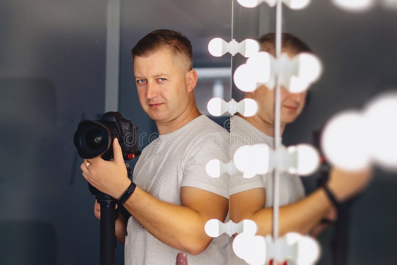 Cameraman with a Camera on a Mono-pod Stock Photo - Image of handheld ...