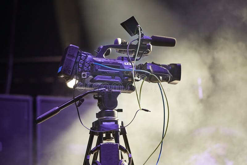 Cameraman at a concert stock photo. Image of filming - 99212126