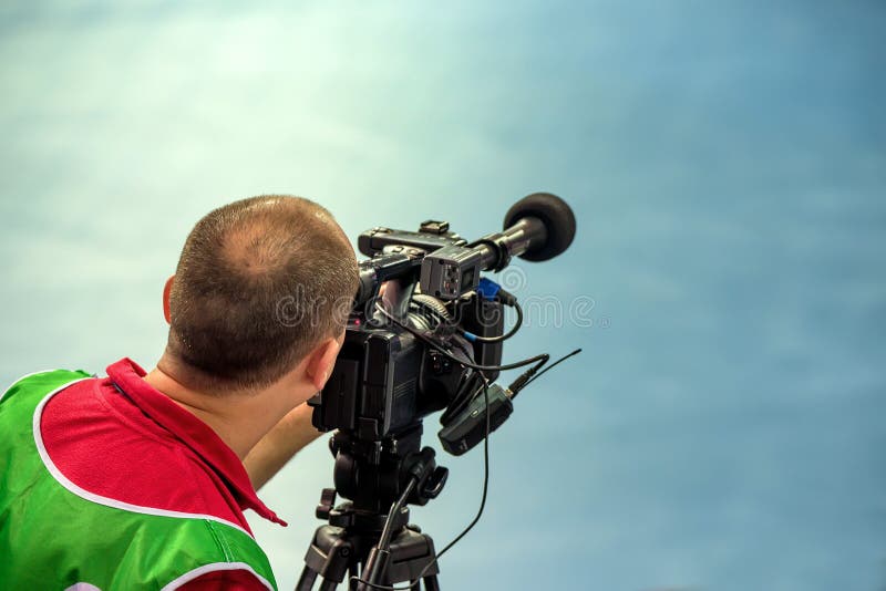 Cameraman filming editorial stock photo. Image of visual - 15911778