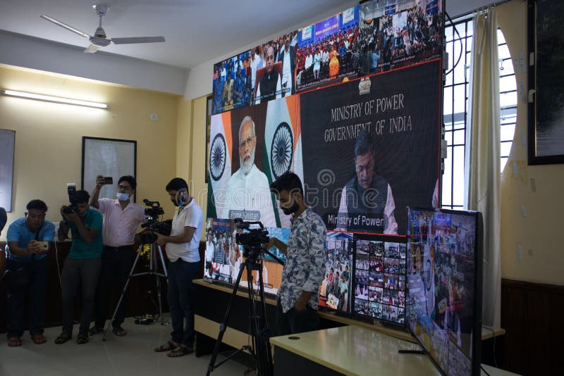 Cameraman in-front of a LED Screen during the Live Interaction of PM of ...