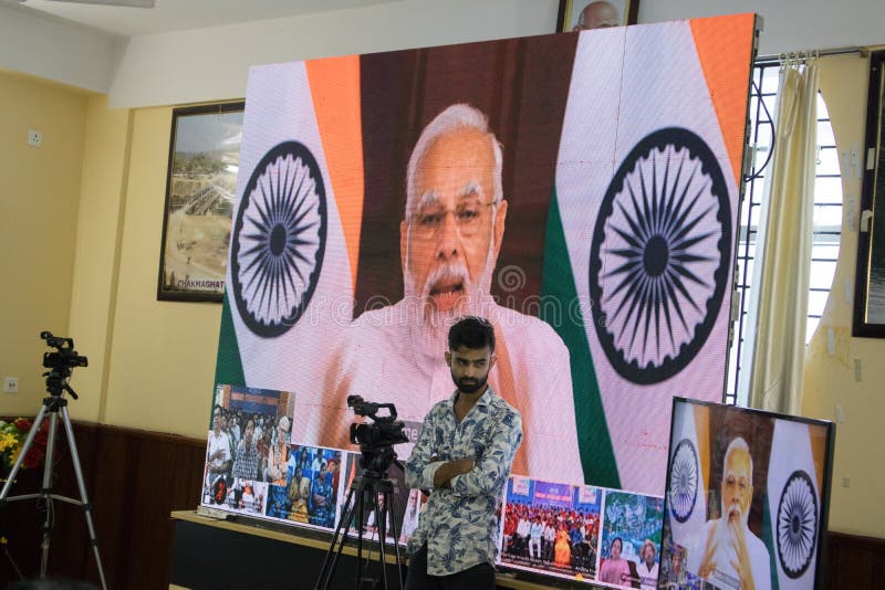 Cameraman in-front of a LED Screen during the Live Interaction of PM of ...