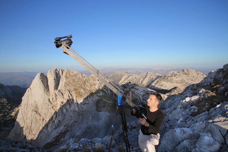 Cameraman on mountain stock image. Image of couple, hill - 34762417