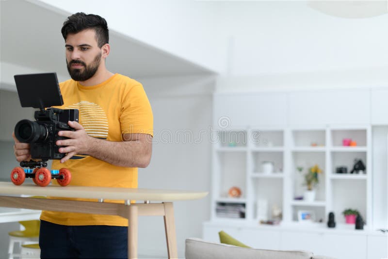 Cameraman with Professional Equipment Shoots Video Clips Stock Photo ...