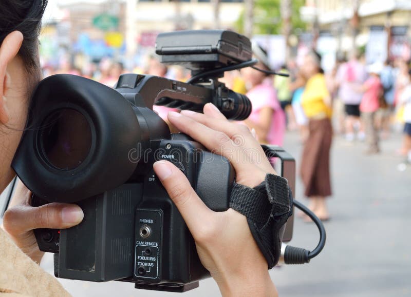 Cameraman recording video stock photo. Image of entertainment - 32398200