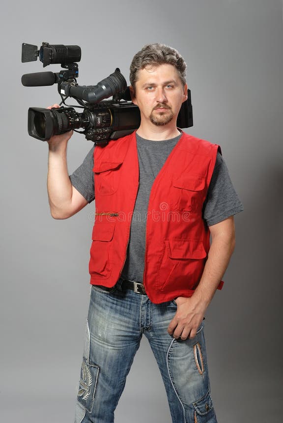 Cameraman in red vest stock photo. Image of cameraman - 14689498