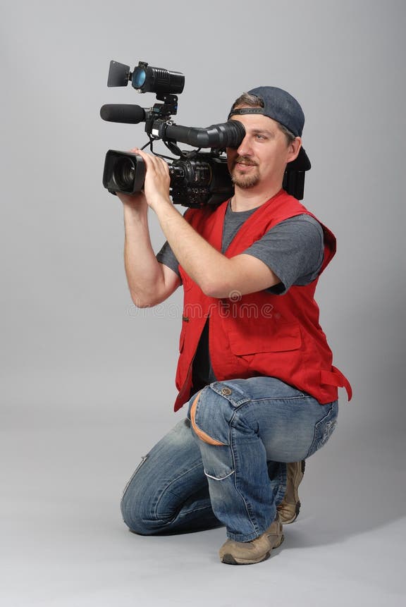 Cameraman in red vest stock photo. Image of occupation - 28443398