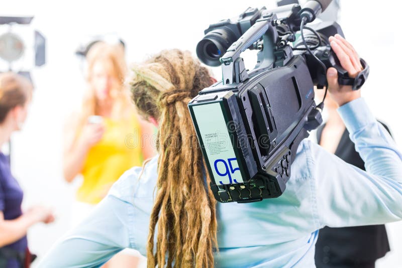 Cameraman Shooting with Camera on Film Set Stock Image - Image of youth ...