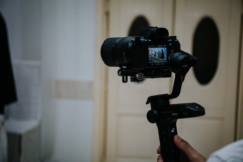 Cameraman Shooting a Wedding Ceremony with a Video Camera Stock Photo ...