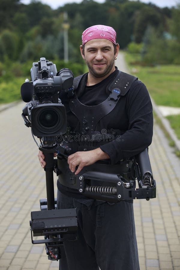 Cameraman smiles stock photo. Image of bandana, operator - 60204004