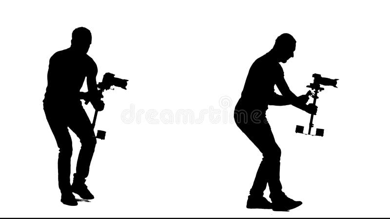 Cameraman Steps with the Camera and Steadicam. White Background ...