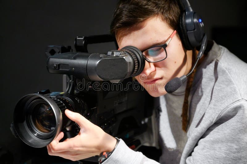 Cameraman Using Professional Digital Video Camera. Stock Image - Image ...