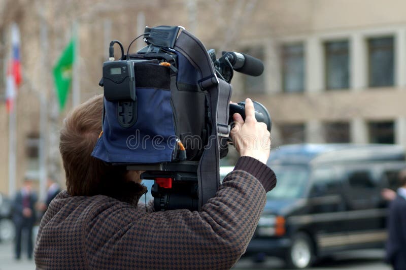 Cameraman at work stock image. Image of information, movie - 14458781