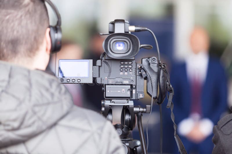 Video Camera Operator Working at Press Conference Stock Image - Image ...