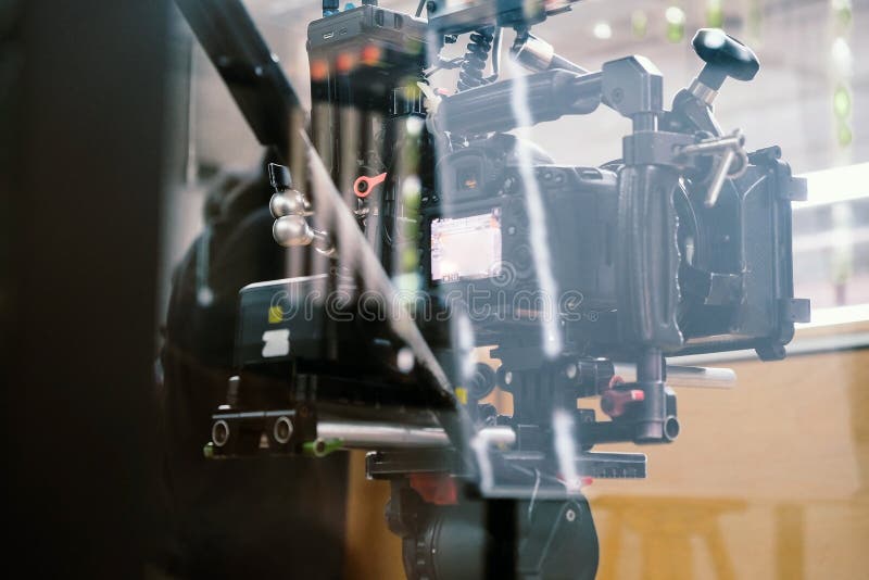 Cameras and Professional Video Camera on a Tripod in a Movie Studio ...