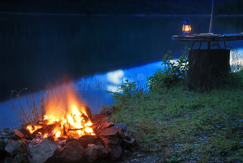 Camping at Night with a Fire Stock Image - Image of people, vacation ...