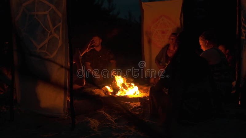 Camp Fire Burning on a Mountain on Midsummer Night. People by the Fire ...