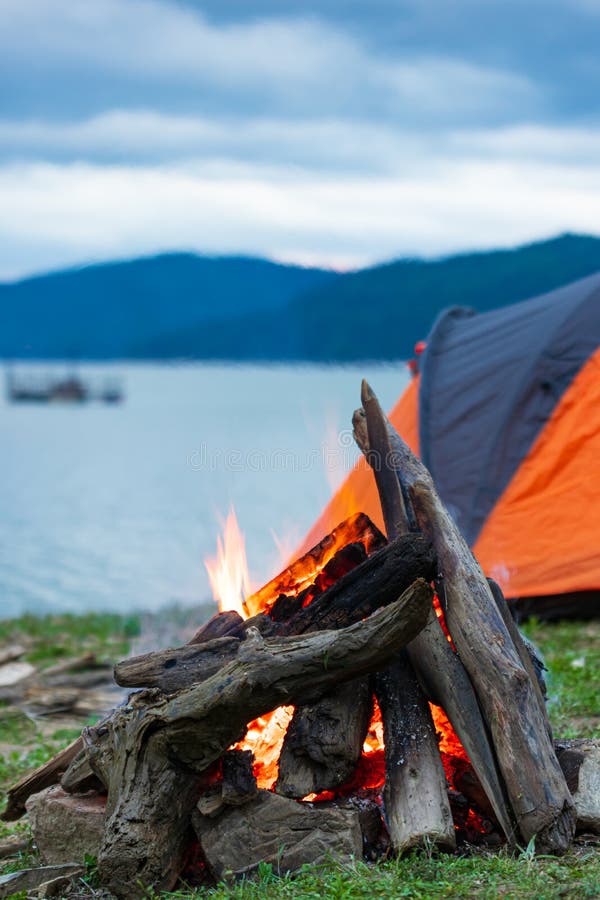 Camp Fire in the Mountains. Tent on the Lake Shore Stock Image - Image ...