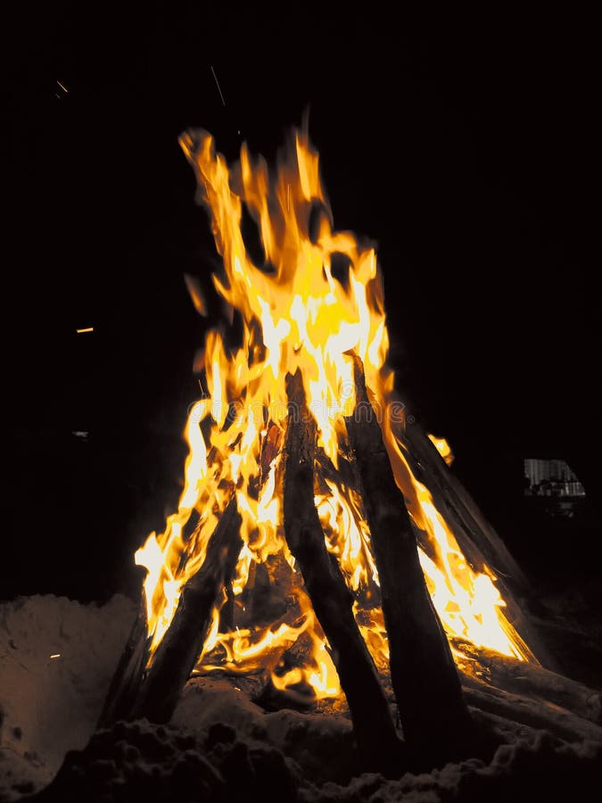 Camp fire at night stock photo. Image of panorama, camp - 390944308