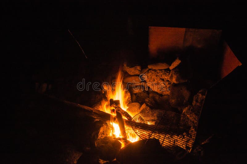 Camp fire in the night stock photo. Image of adventure - 146686706
