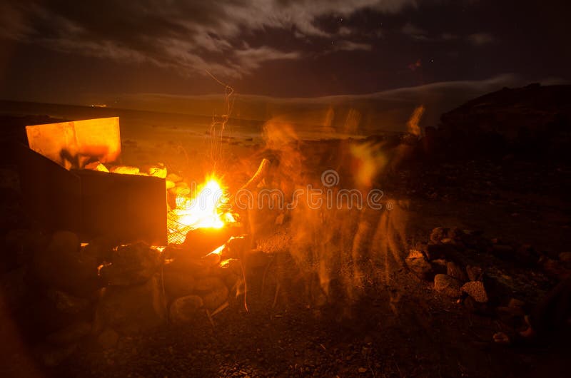 Camp fire in the night stock photo. Image of light, texture - 165081294