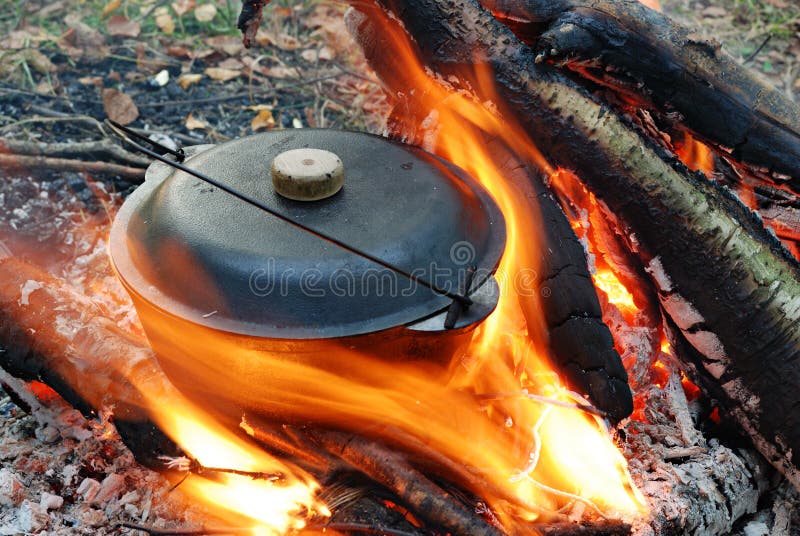 Camp fire and pot stock photo. Image of nature, closeup - 21362164