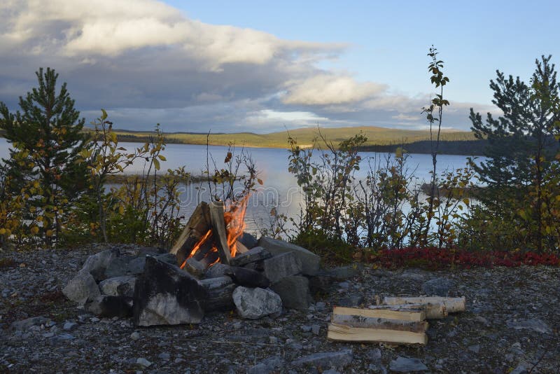 Camp Fire in Sweden on a Lake Stock Image - Image of burn, lake: 121270031