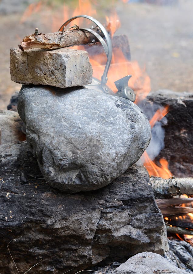 Camp kettle at the stake stock photo. Image of appliance - 98326862