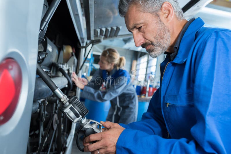 Camper Van Mechanics at Work Stock Photo - Image of equality ...