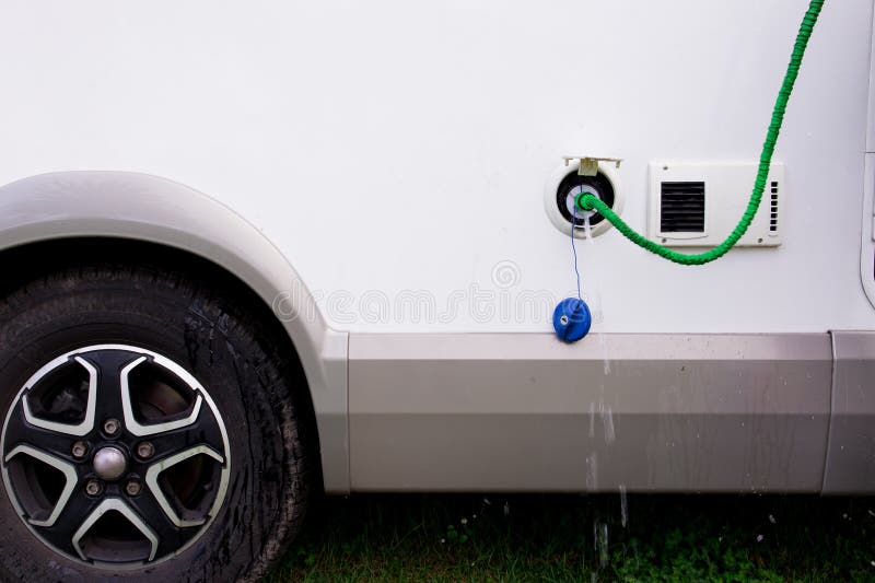 Campervan Water Hose Connection with Dripping Tap Close Up Stock Image ...