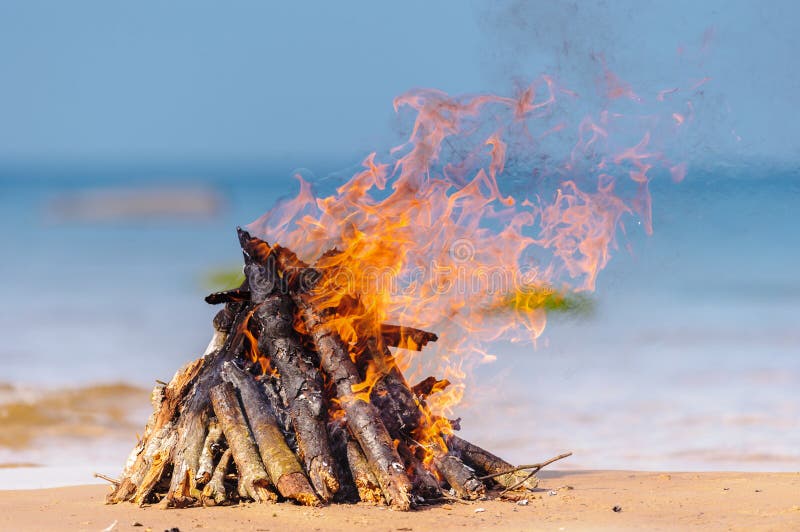 Campfire on the beach stock image. Image of burning, beach - 60618291