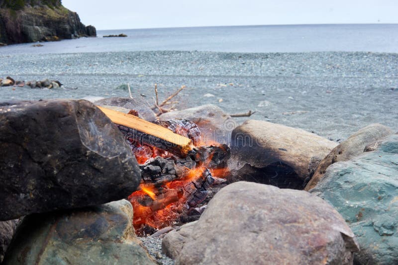Campfire on a Beach with a Sea View Stock Image - Image of stones ...